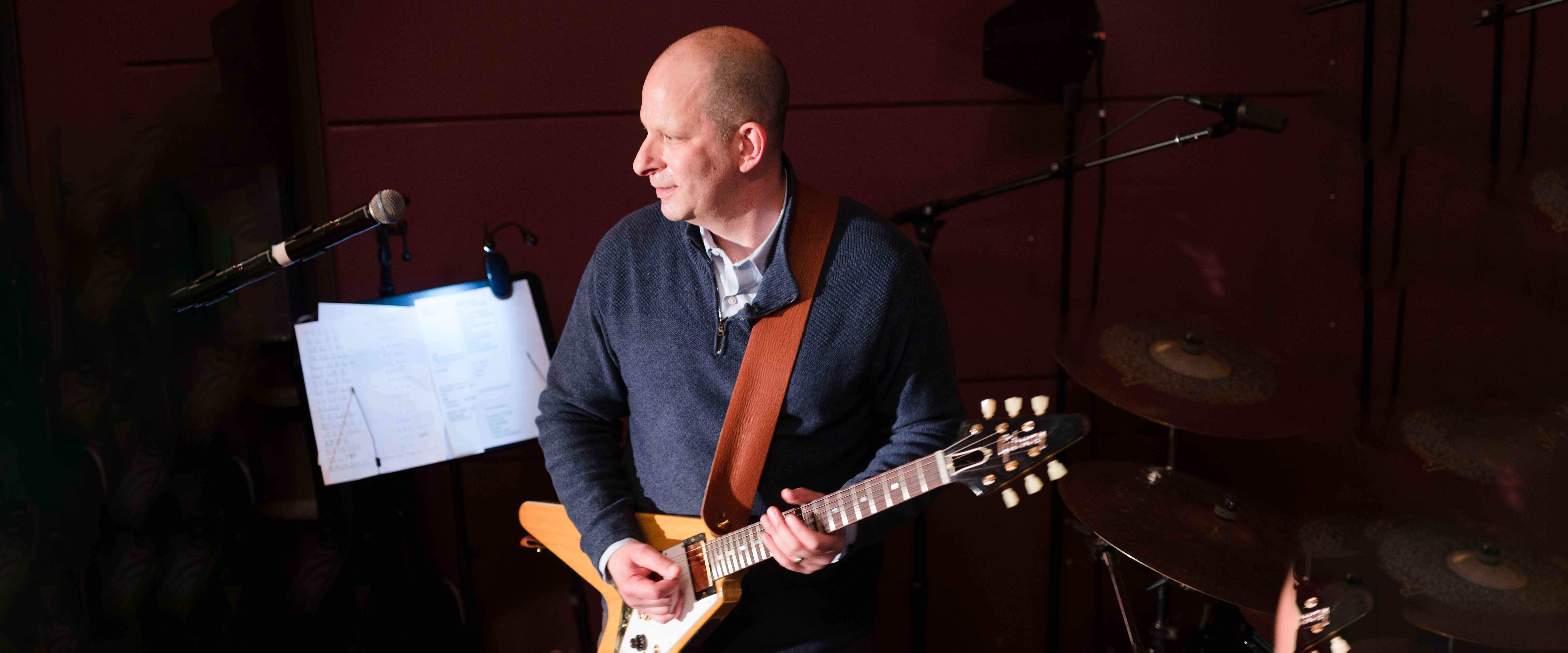 Finance professor's bar band will rock graduate program commencement ...