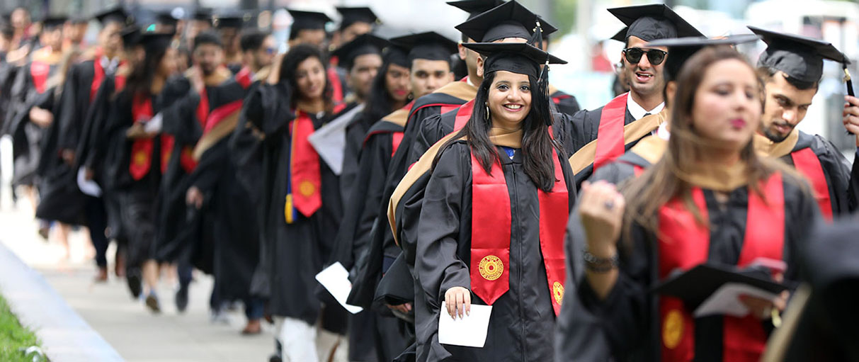 A ceremonious transition from graduate students to alumni | Rutgers ...